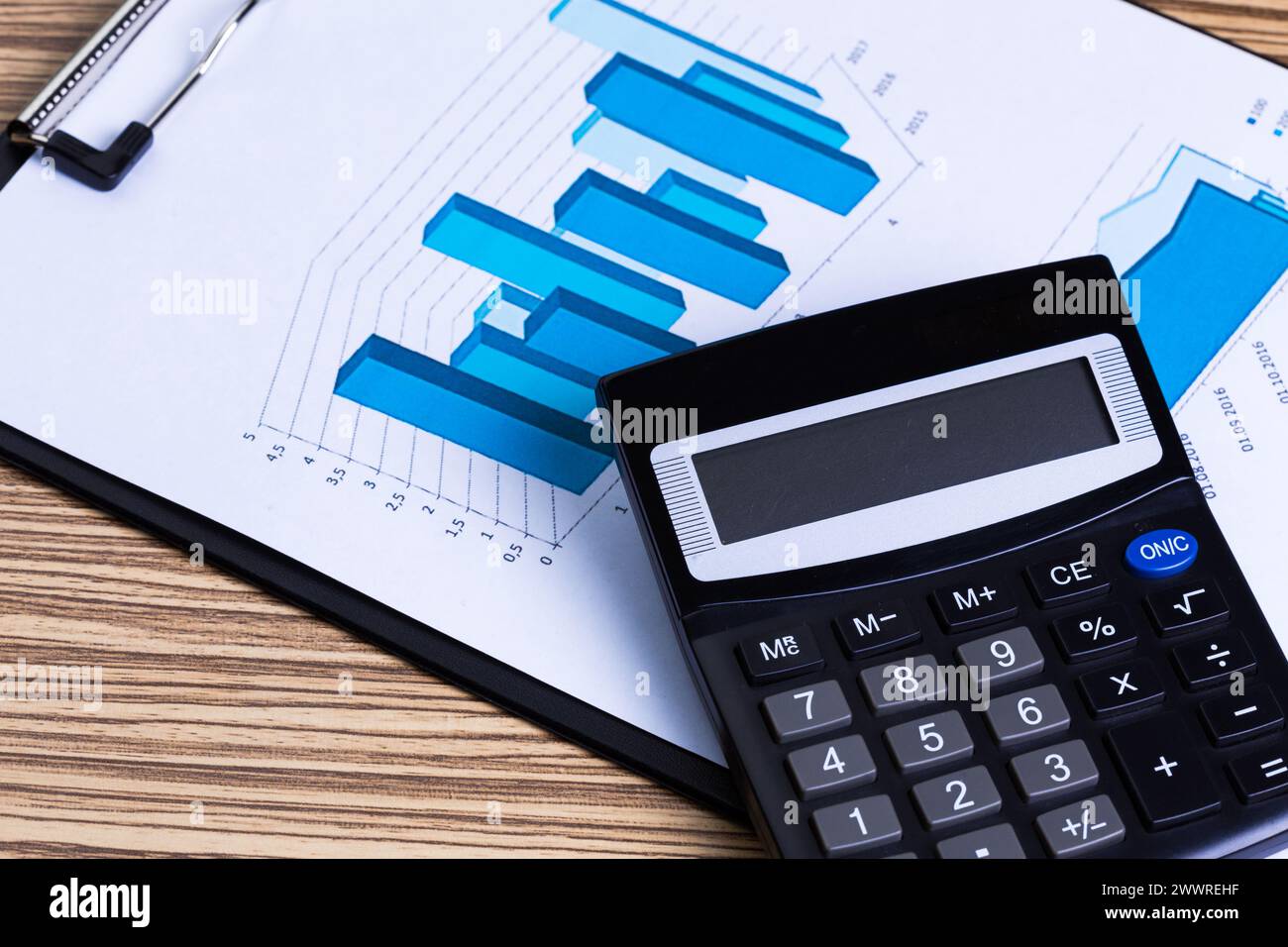Graphs and Calculator Stock Photo - Alamy