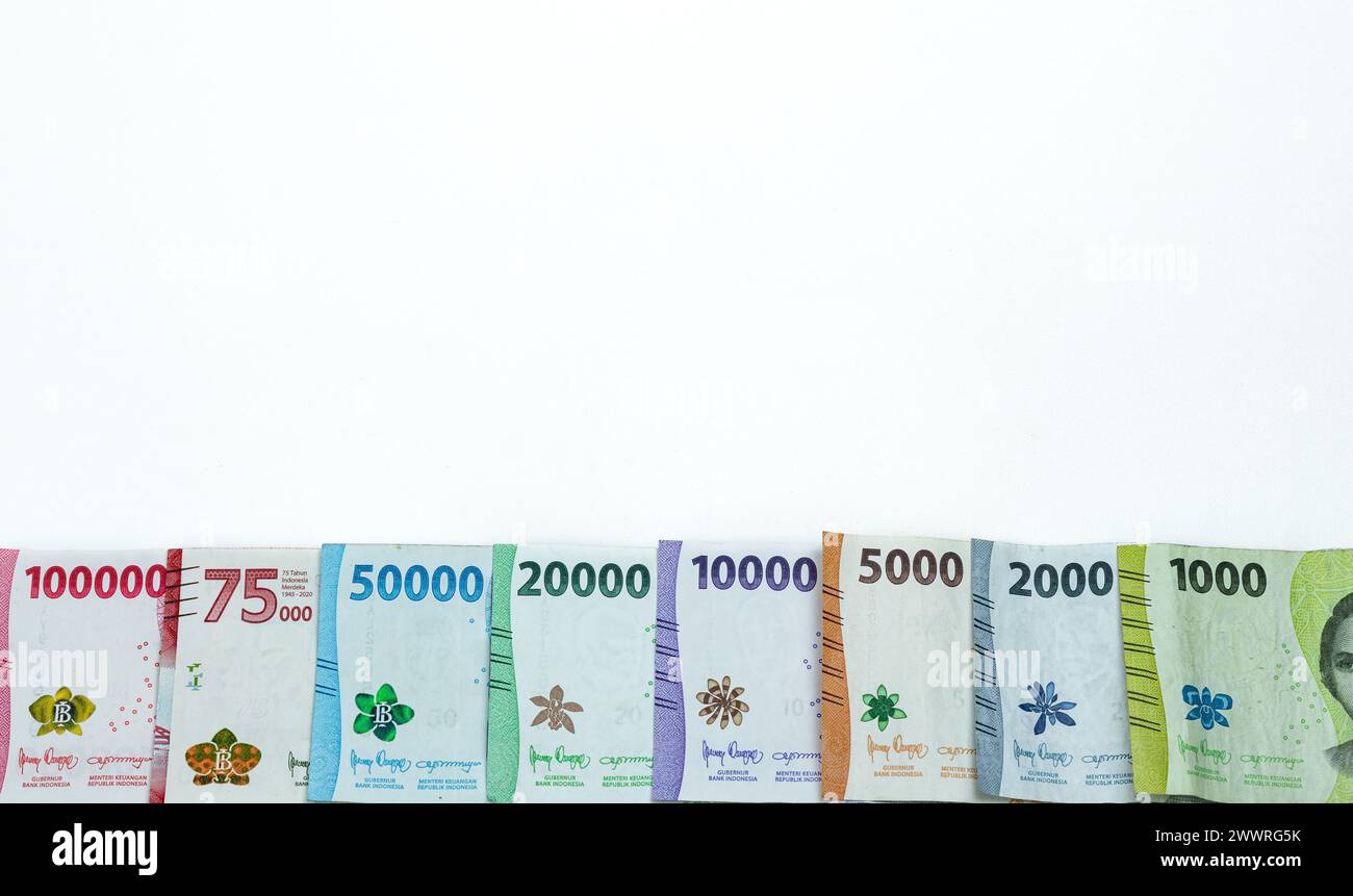 Indonesian currency . Stack of Rupiah or IDR banknotes isolated on ...