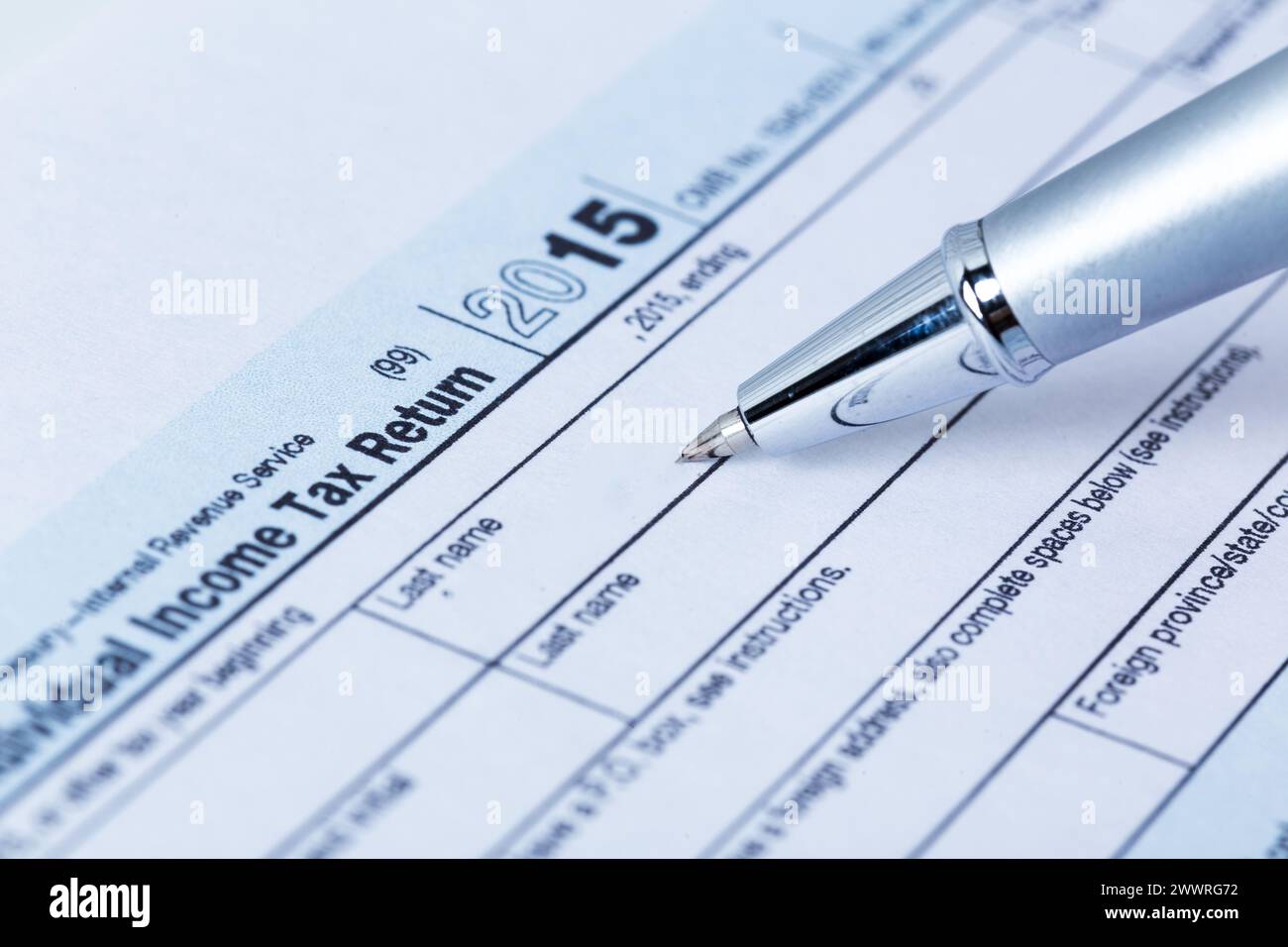 Income tax form and pen Stock Photo - Alamy