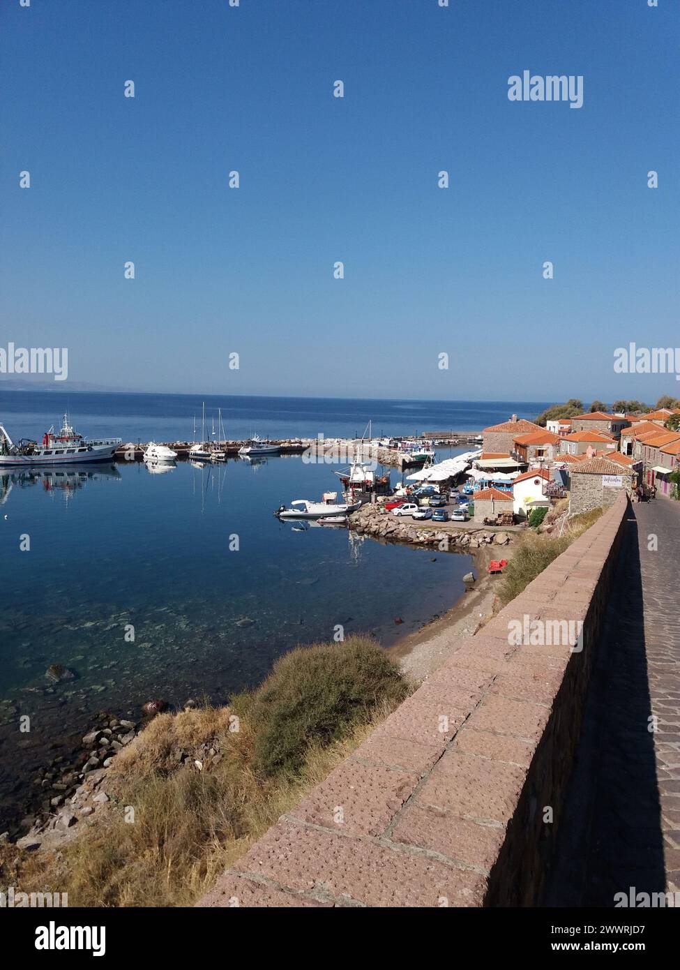 the Multiple boats floating on a vast body of water, Lesbos Greece ...
