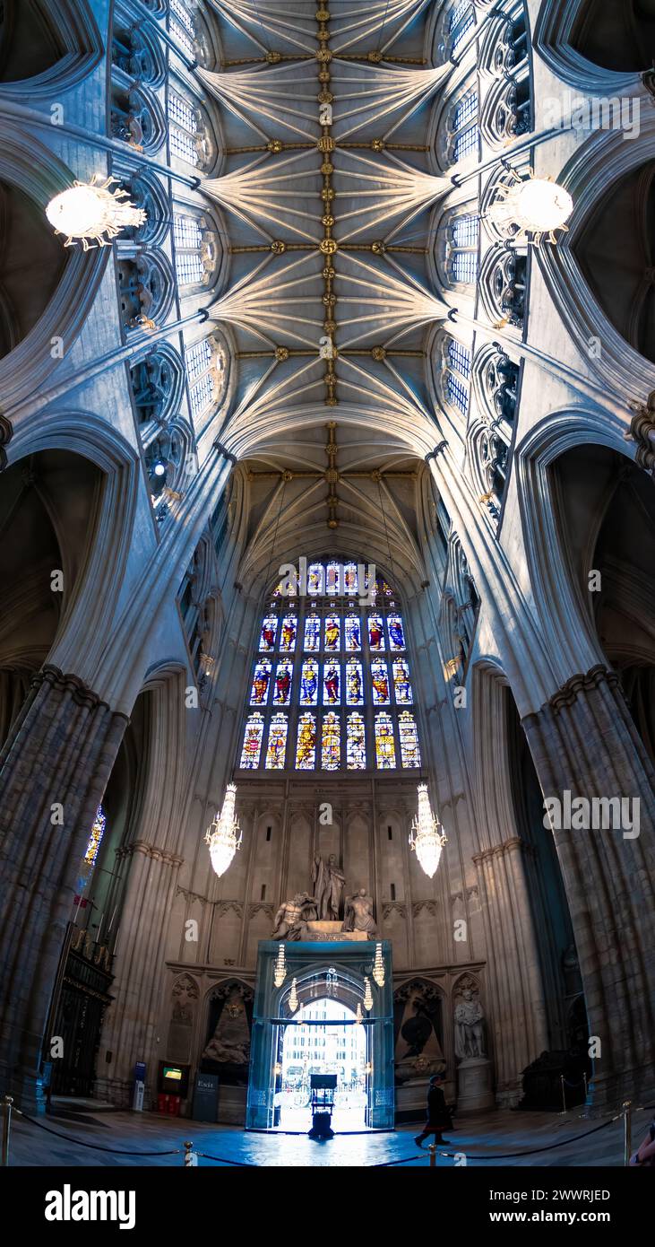 Vertical interior shot of a Gothic cathedral with vaulted ceilings and ...