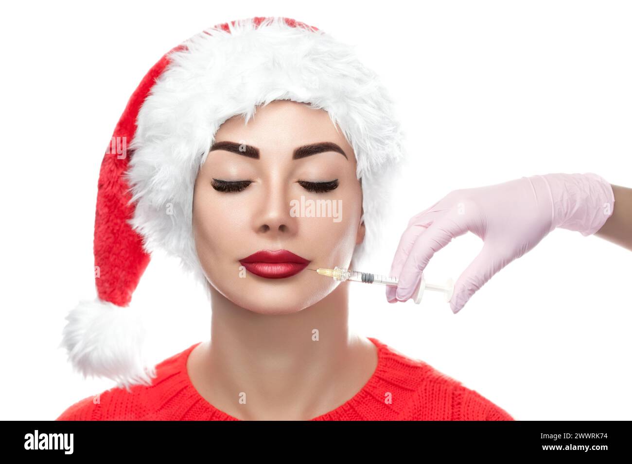 The doctor cosmetologist makes the Botulinum toxin injection on the ...