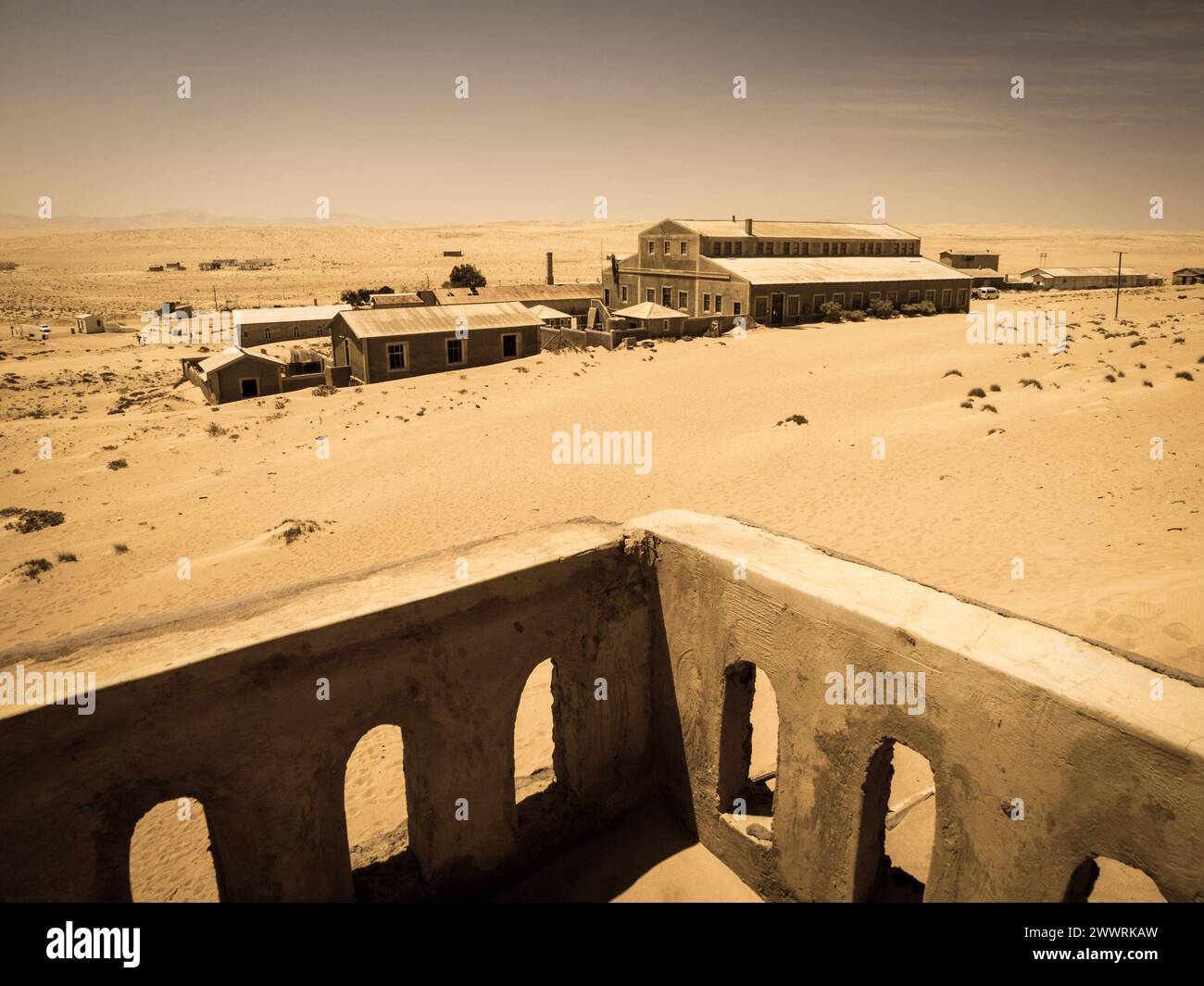 Ghost buildings of old diamond mining town Kolmanskop near Luderitz in ...