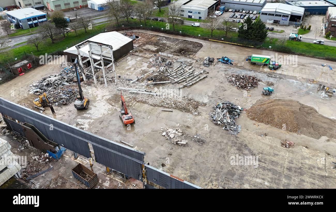 Unfinished building among construction sites in a city Stock Photo - Alamy