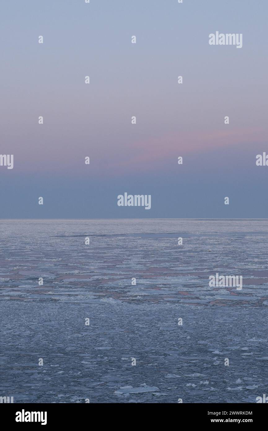 The Small ice formations partially frozen at the ocean's edge Stock ...