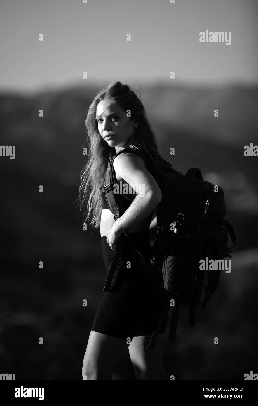 Woman traveler looking at Batur volcano. Indonesia. Female hiker with ...