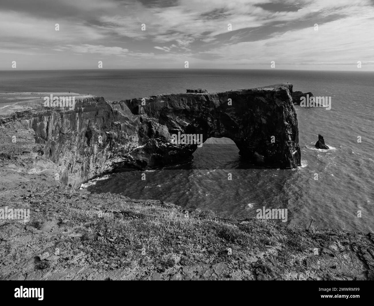 Monumental rock gate in the sea, Cape Dyrholaey, southern Iceland ...
