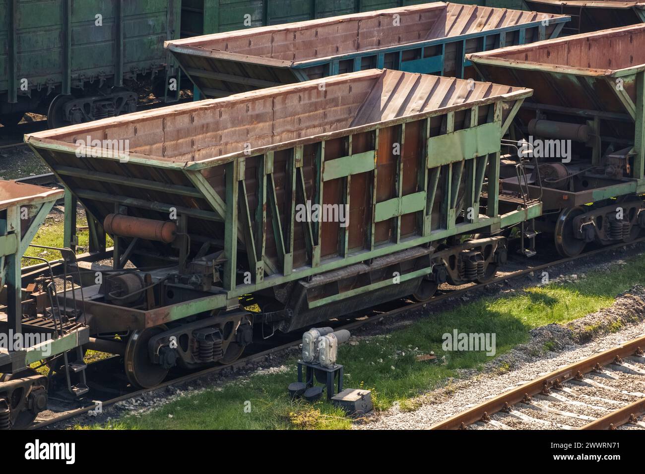 A group of freight train wagons is on the railway track Stock Photo - Alamy