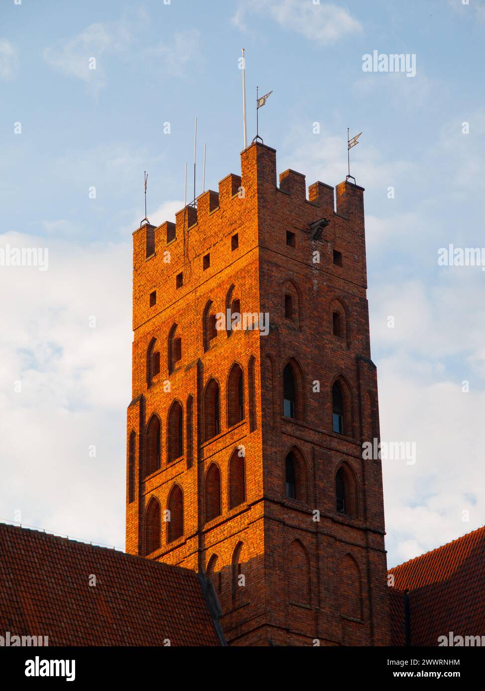 The Main tower of Malbork Upper castle at sunset time, Poland Stock ...