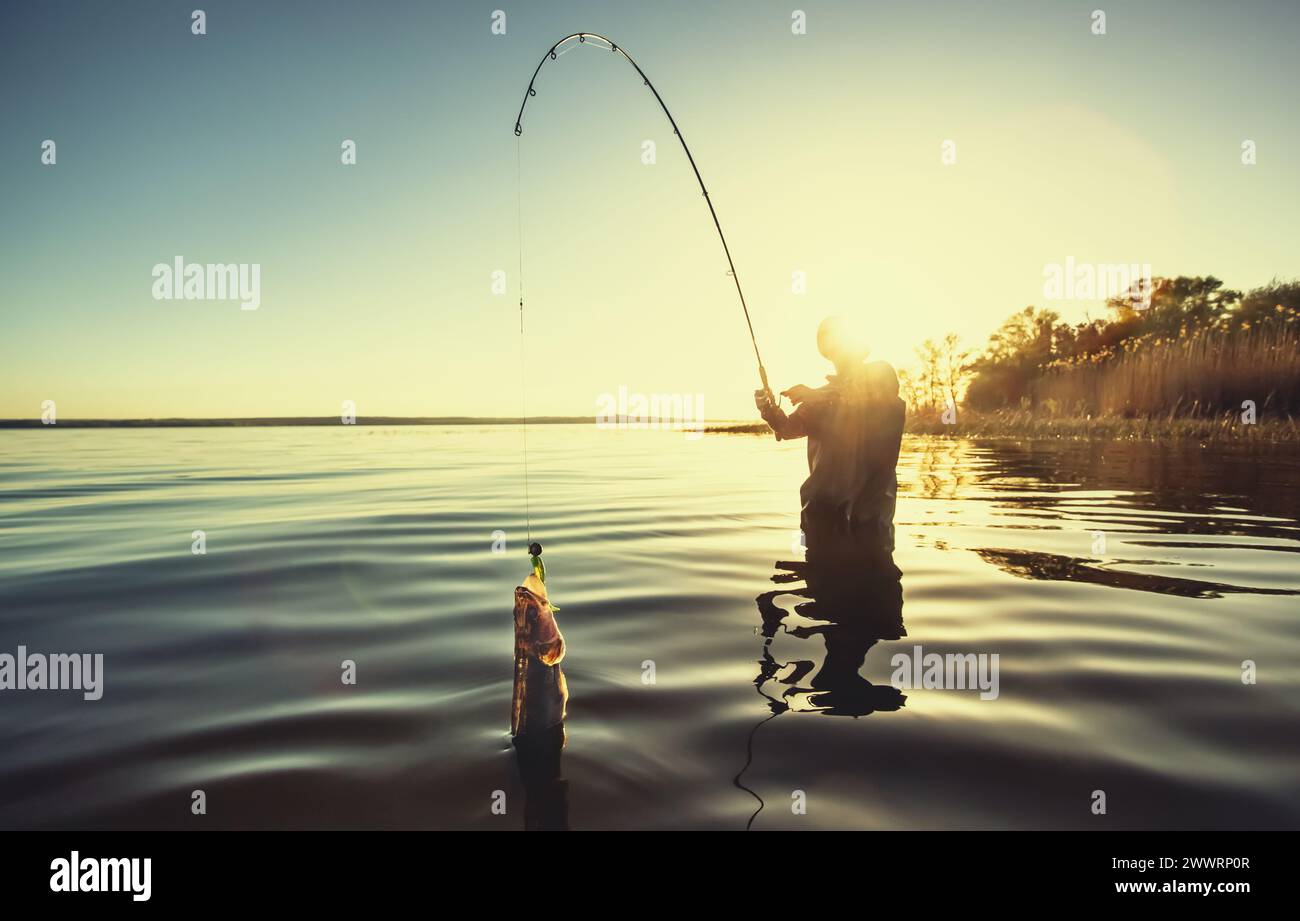 Fisherman rod caught fish hi-res stock photography and images - Alamy
