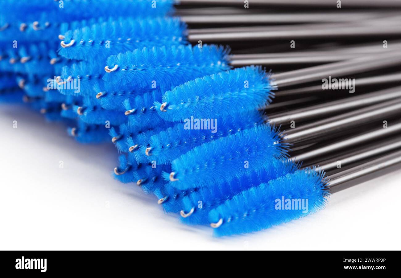 Blue brushes for eyelashes and eyebrows on a white background Stock ...