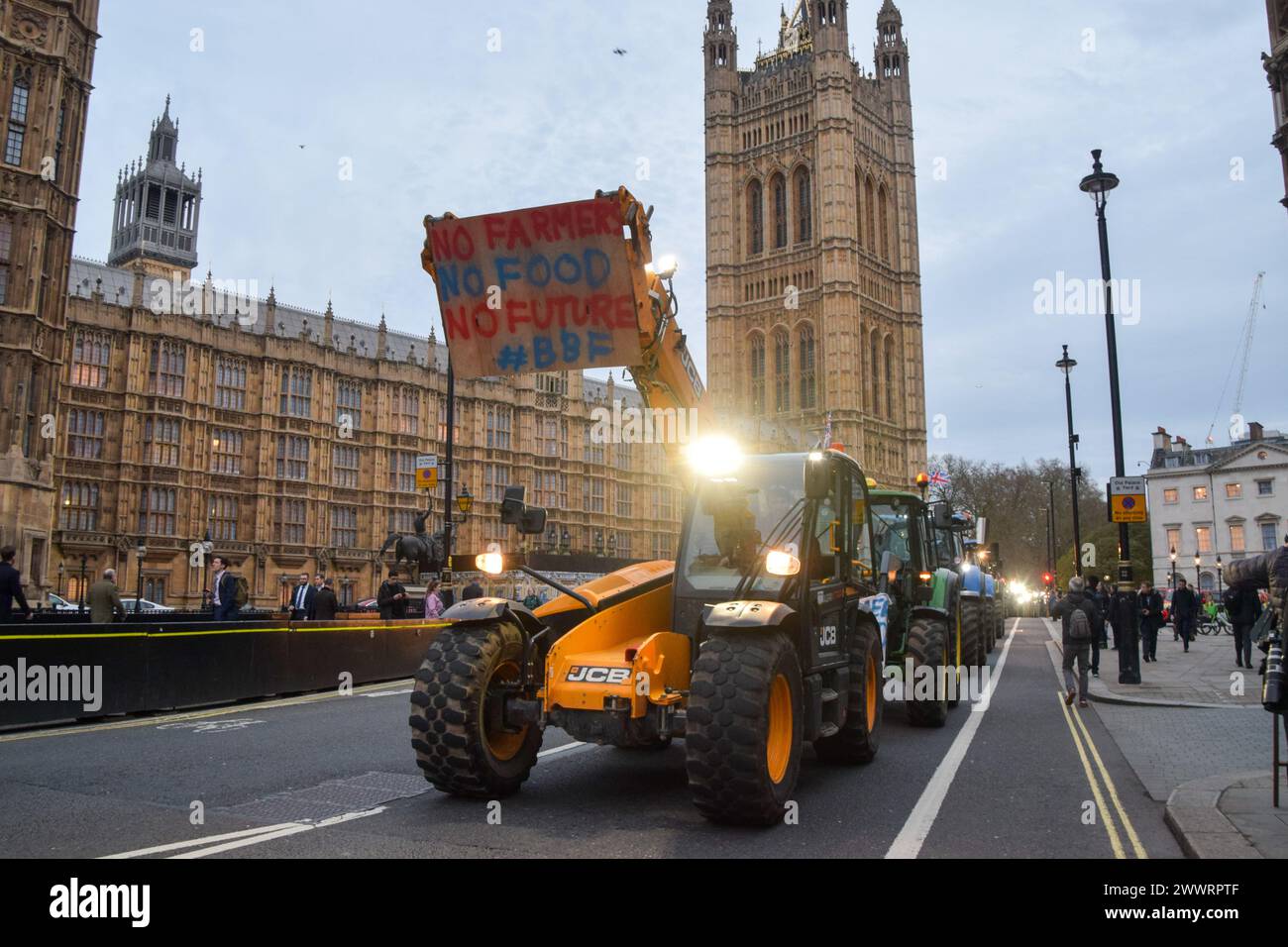 London, England, UK. 25th Mar, 2024. British farmers in tractors stage ...