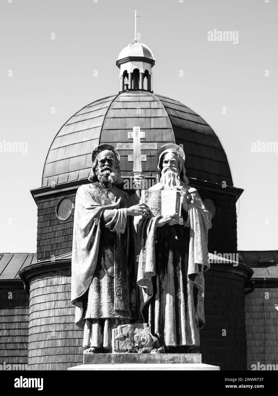 Religious statue and wooden chapel of Saint Cyril and Methodius on Radhost Mountain in Beskids ...