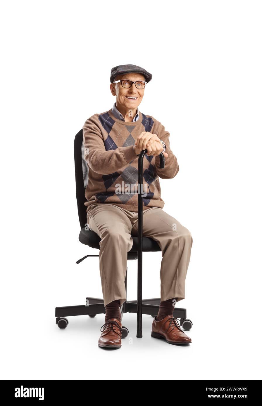 Elderly man sitting in an office chair and leaning on a cane isolated ...