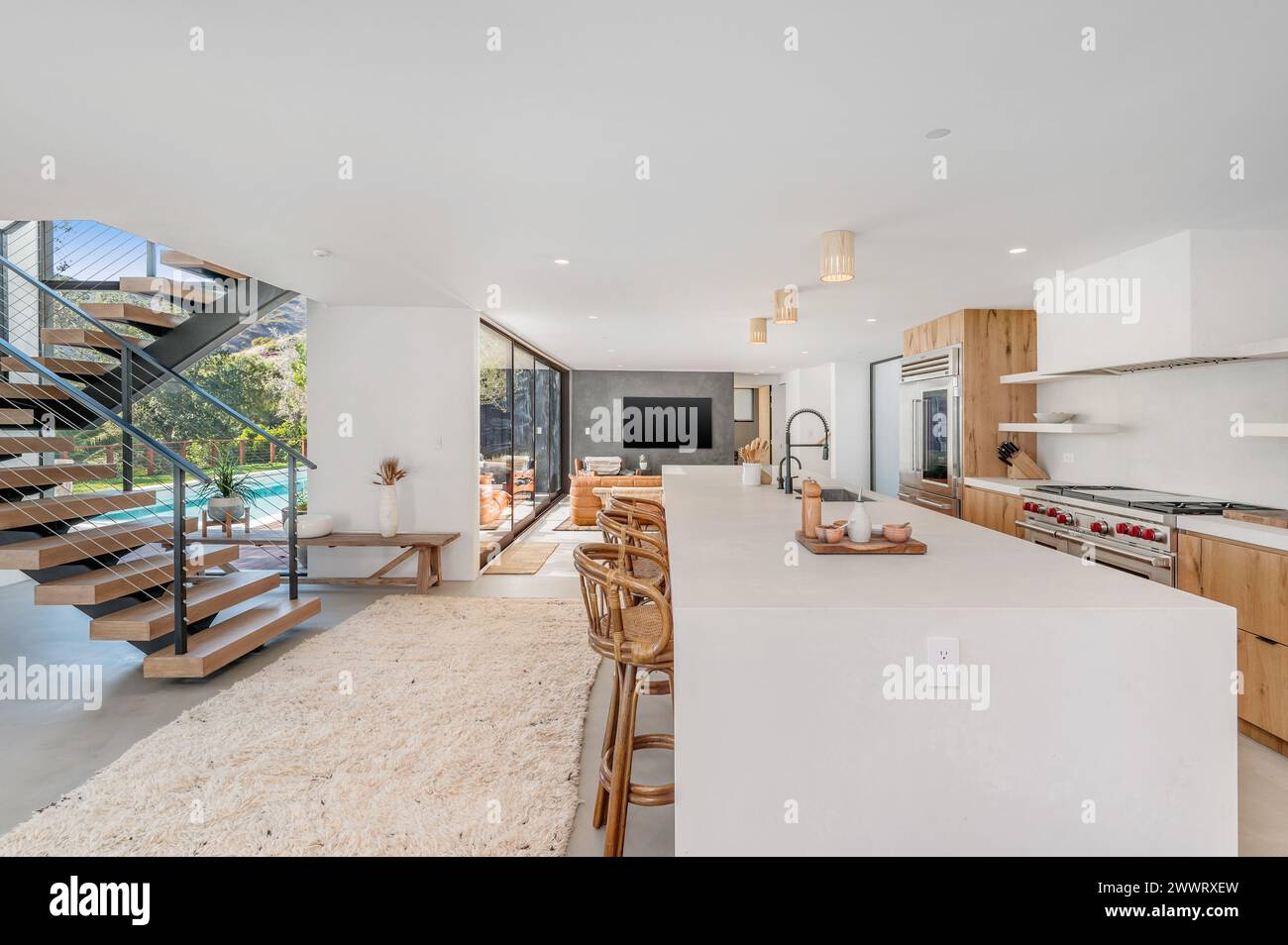 Spacious modern kitchen with stainless steel appliances and wooden ...