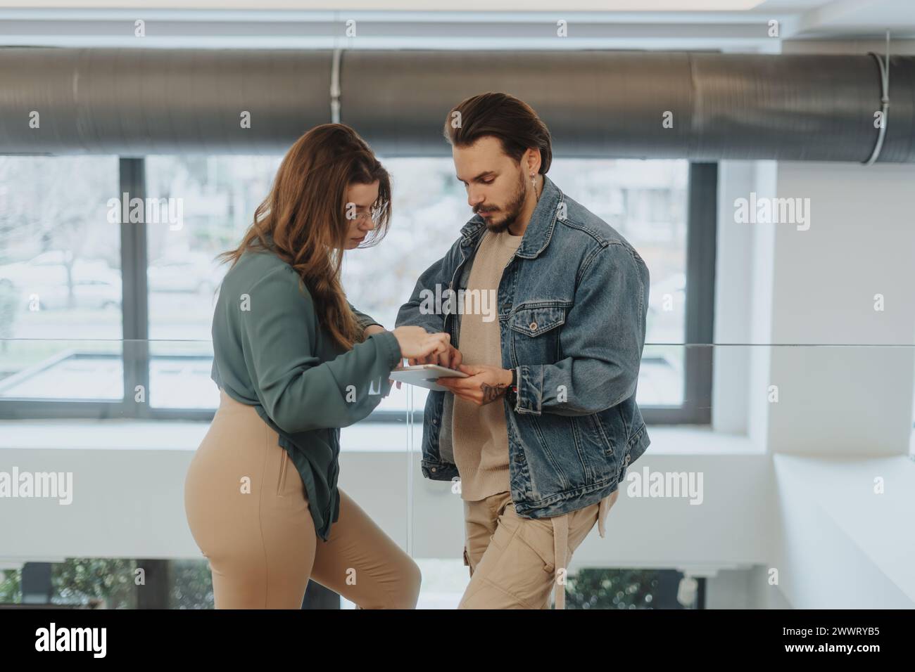 Confident colleagues in a positive office atmosphere. Collaborating ...