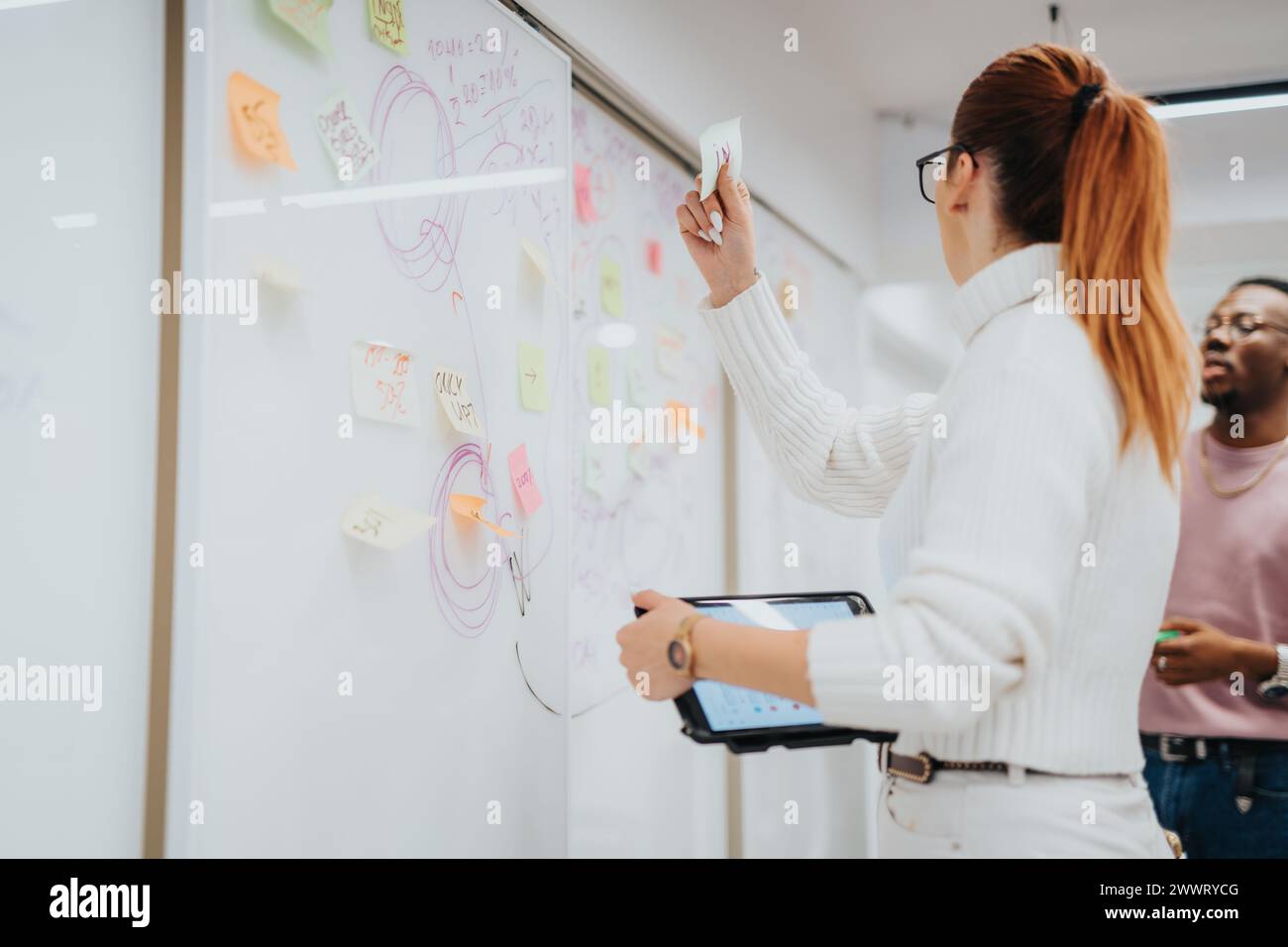 Creative brainstorming session in a modern corporate office Stock Photo ...