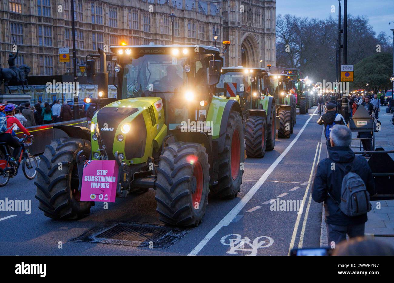 London, UK. 25th Mar, 2024. More than 100 tractors have rolled past the ...