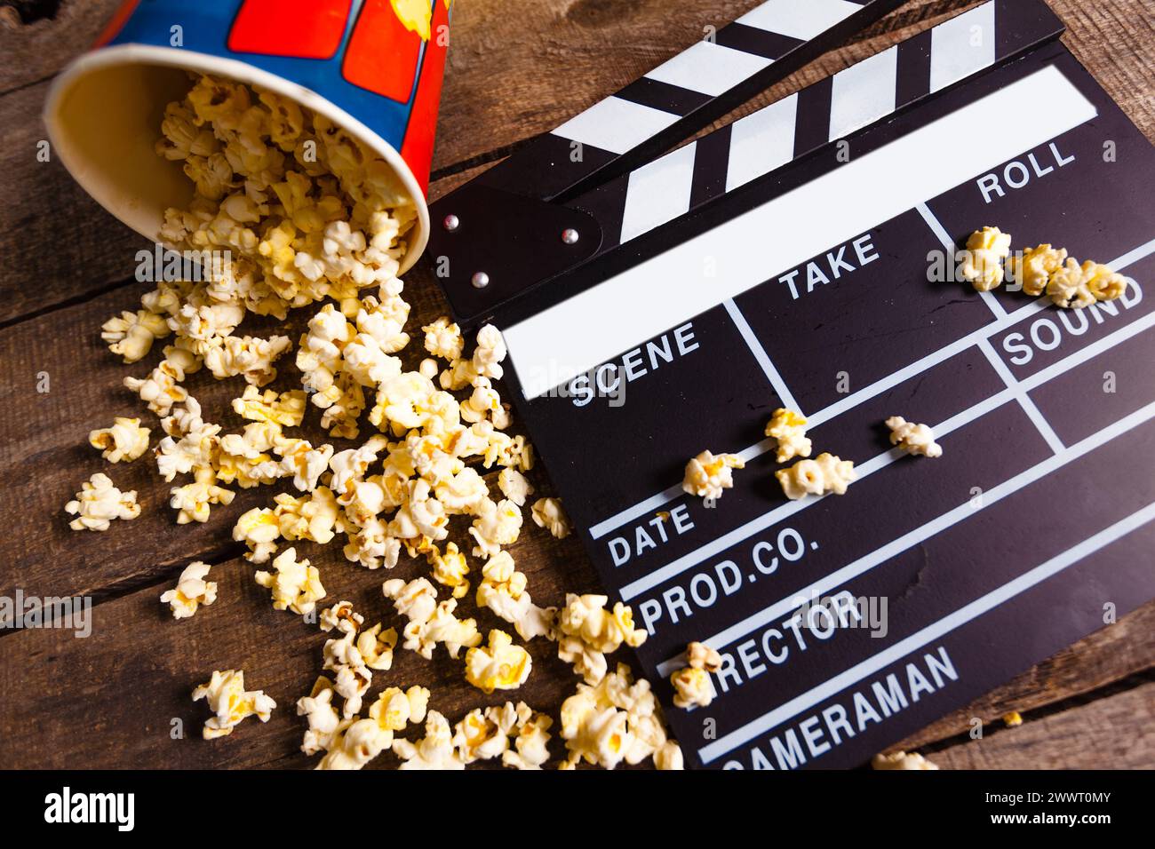 popcorn box with clapper board Stock Photo - Alamy