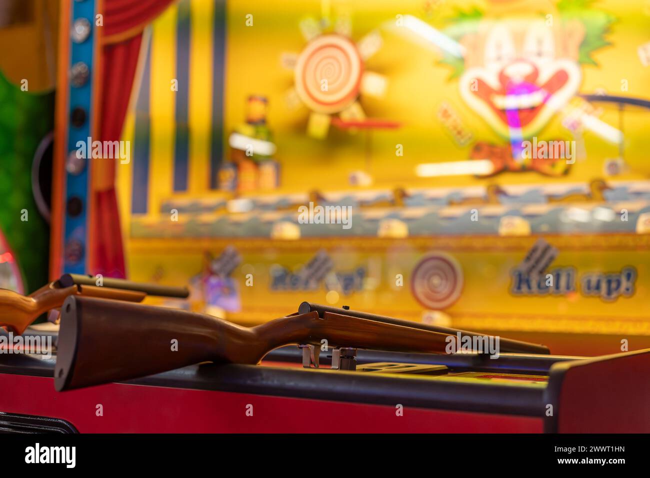 Close up of a rifle at a shooting gallery in the amusement arcade of a ...