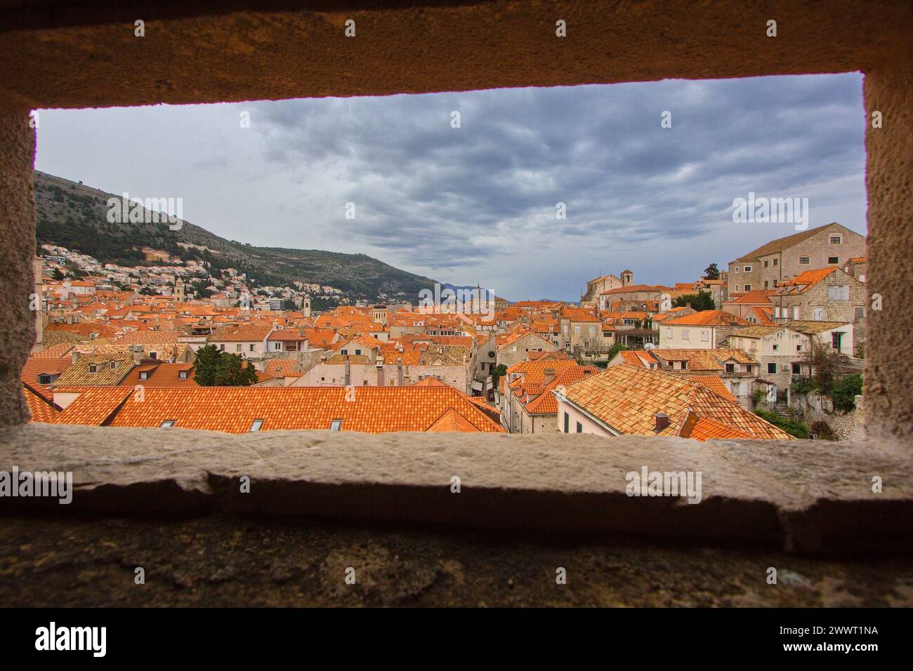 View through the fort window to the rooftop of Old town in Dubrovnik ...