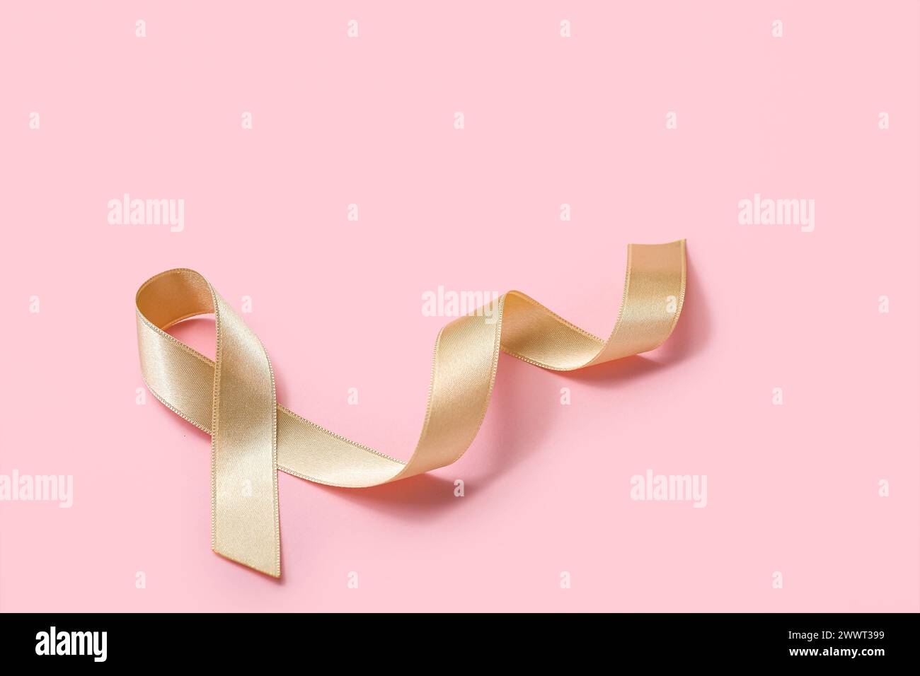 Beige ribbon on pink background. Uterine cancer awareness concept Stock ...
