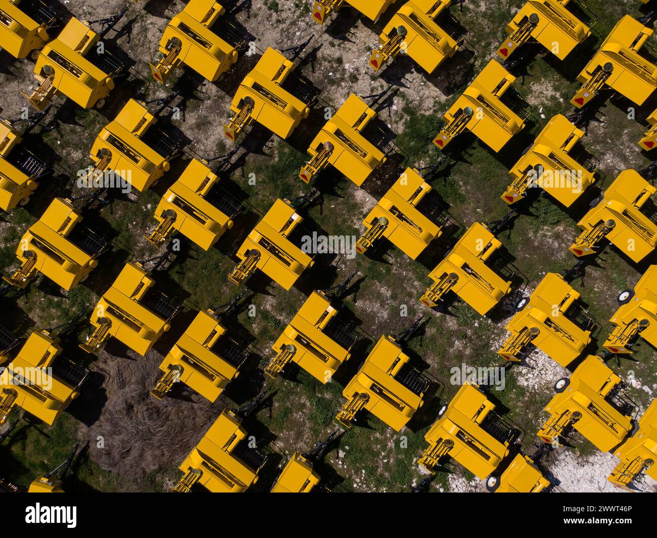 Aerial view of the area where balers produced by a factory are stored ...