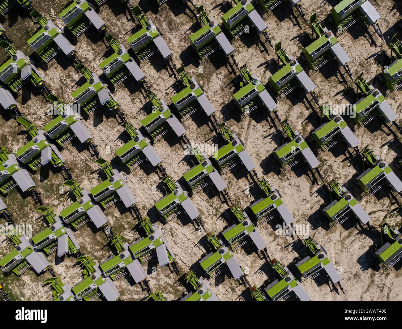 Aerial view of the area where green coloured balers produced by a ...