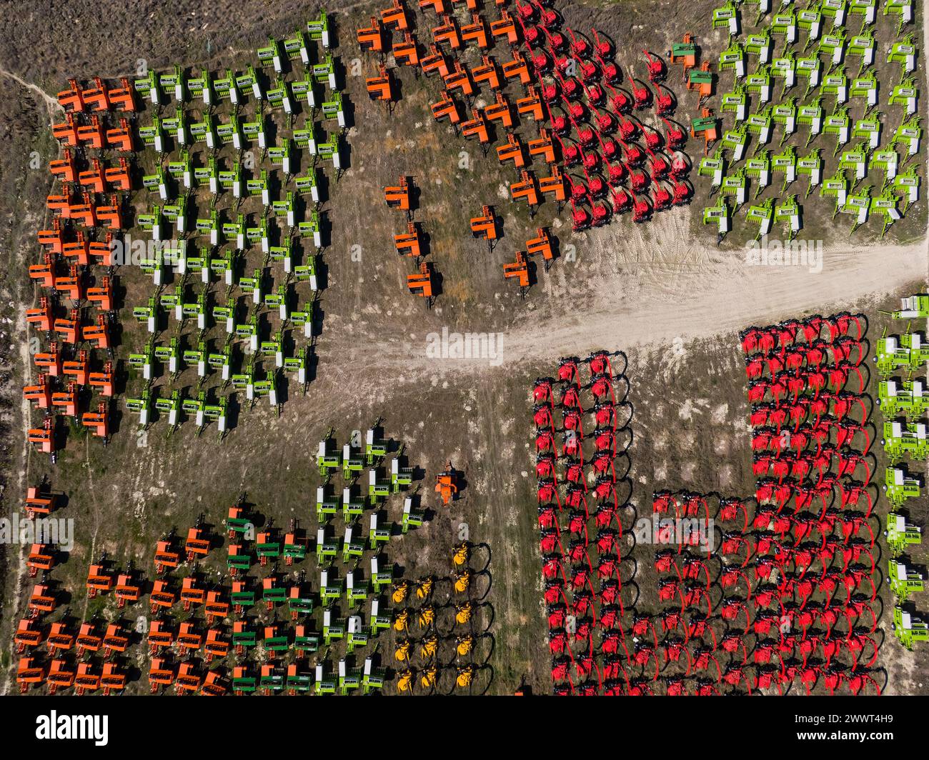 Aerial view of the storage area of coloured balers produced by a ...