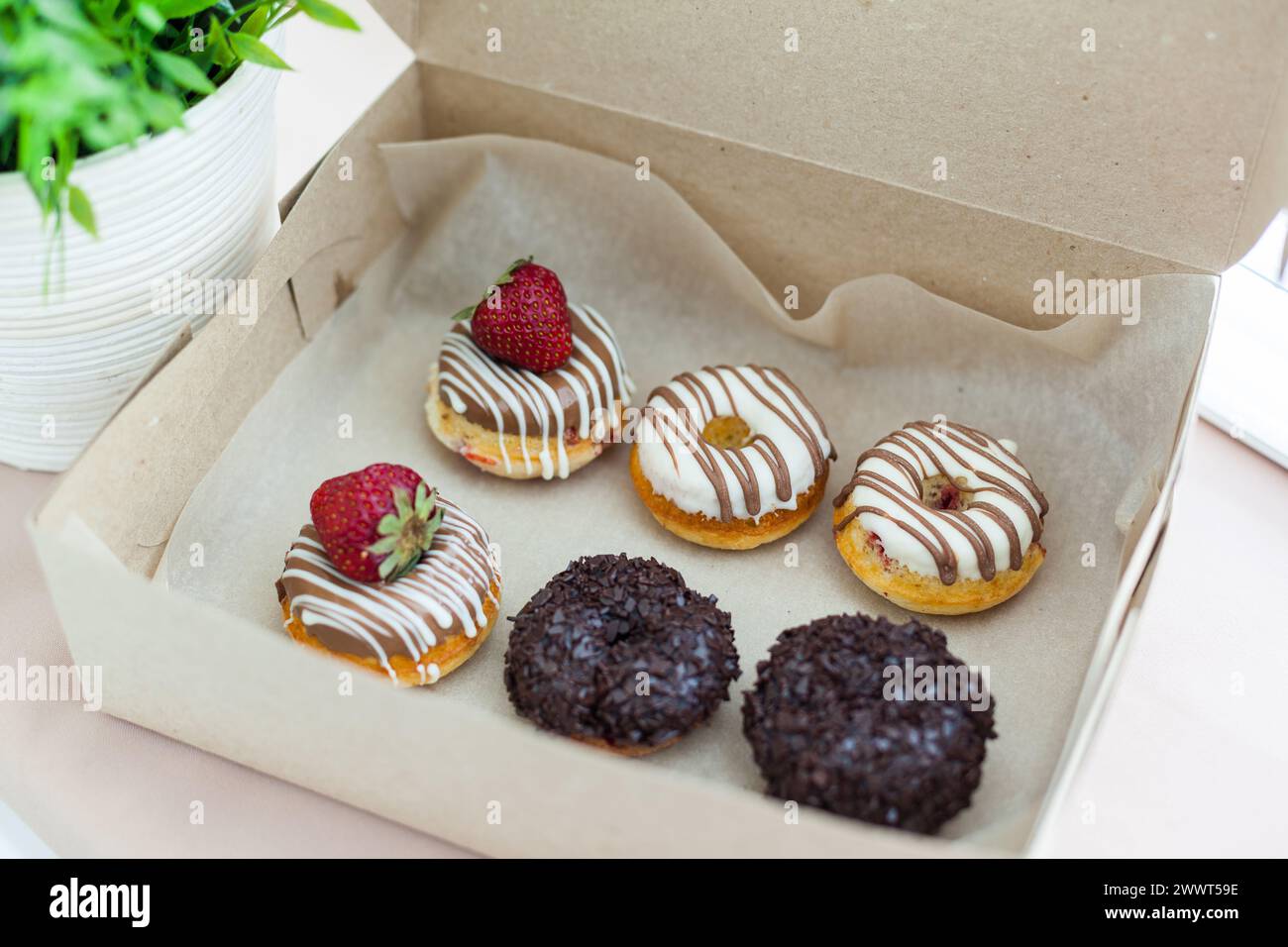 Colorful donuts in box Stock Photo - Alamy