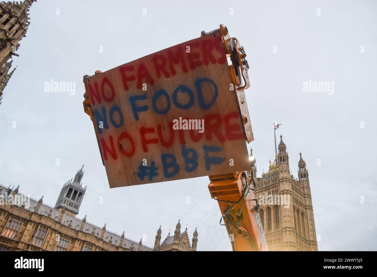 London, UK. 25th March 2024. British farmers in tractors stage a ...