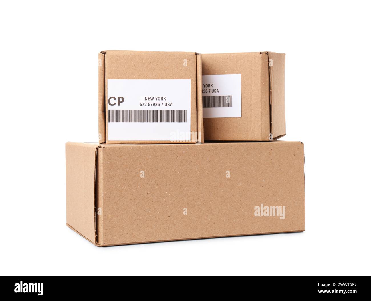 Cardboard packages with shipping labels and barcodes on white ...