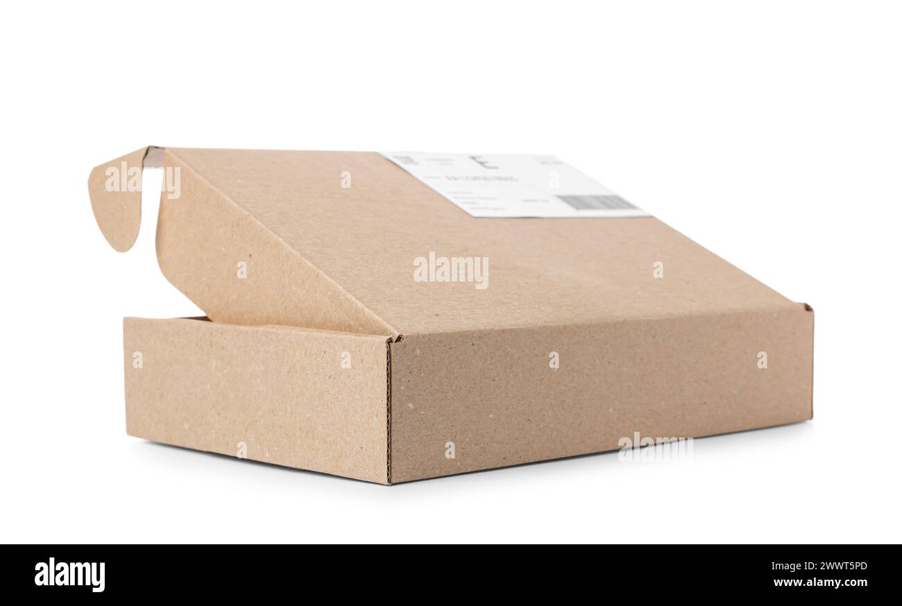 Open cardboard package with shipping label and barcode on white ...