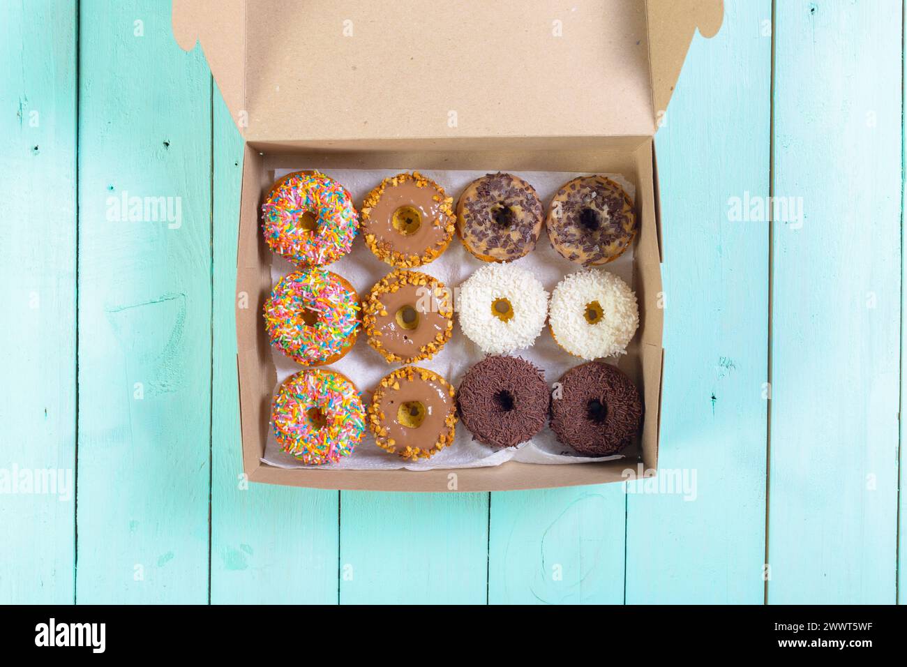 Colorful donuts in box Stock Photo - Alamy