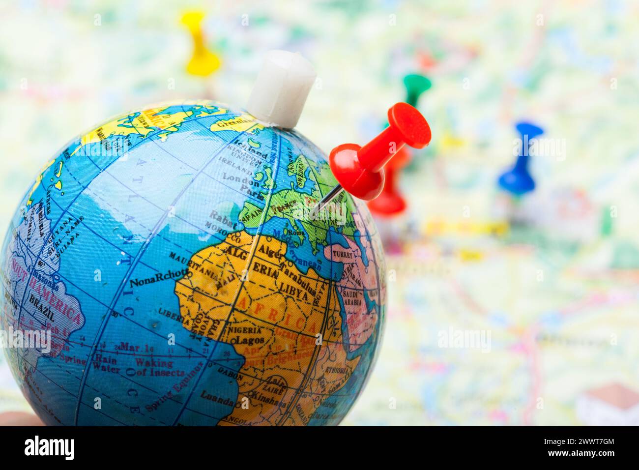 Travel destination points on a map indicated with colorful thumbtacks ...