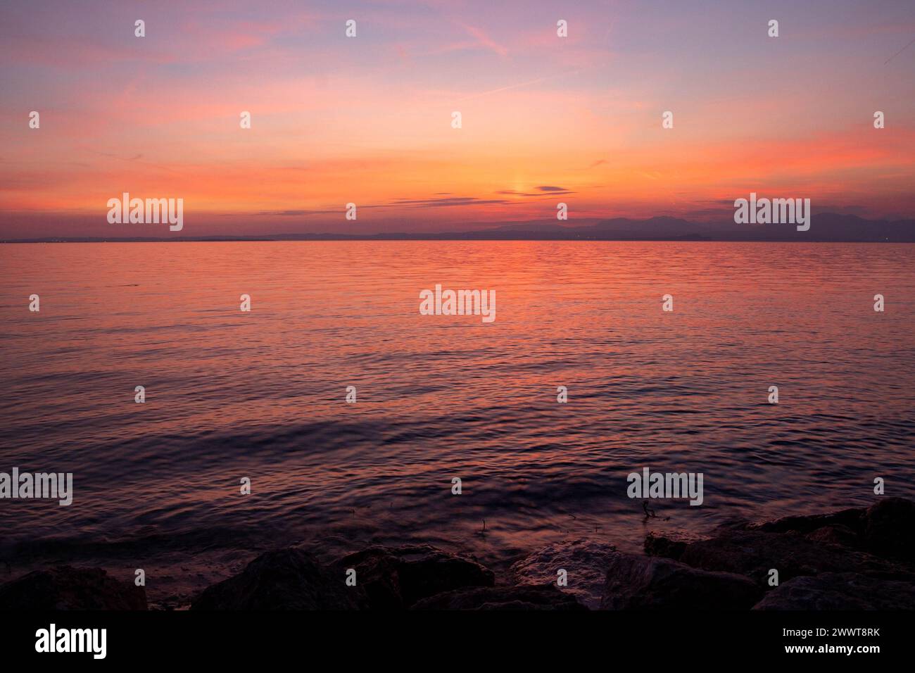Lakeview at sunset from walkway at Cisano, Bardolino, Lake Garda, Italy ...