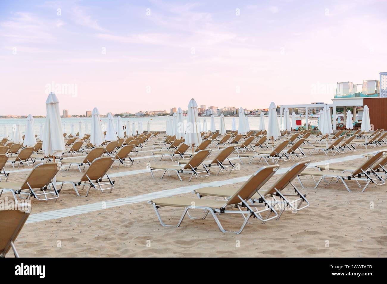 Empty sunbeds near hotel beach hi-res stock photography and images - Alamy