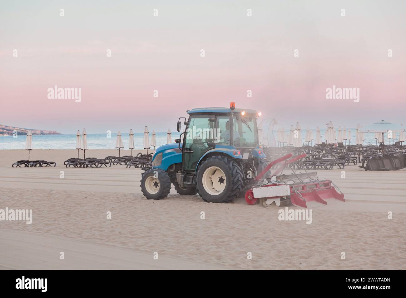 Seaside beach cleaning machine tractor hi-res stock photography and ...