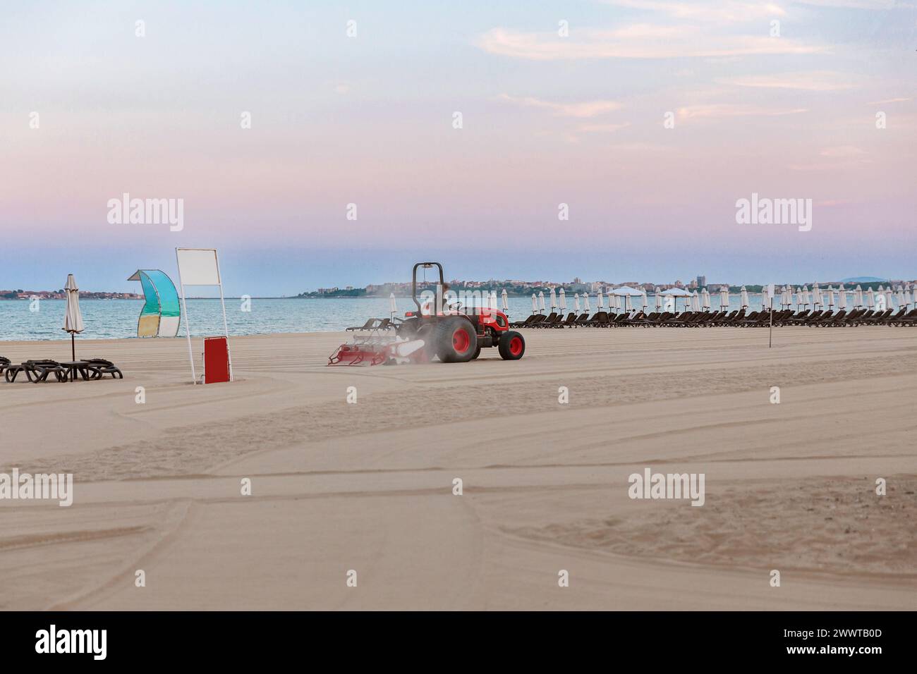 Seaside beach cleaning machine tractor hi-res stock photography and ...