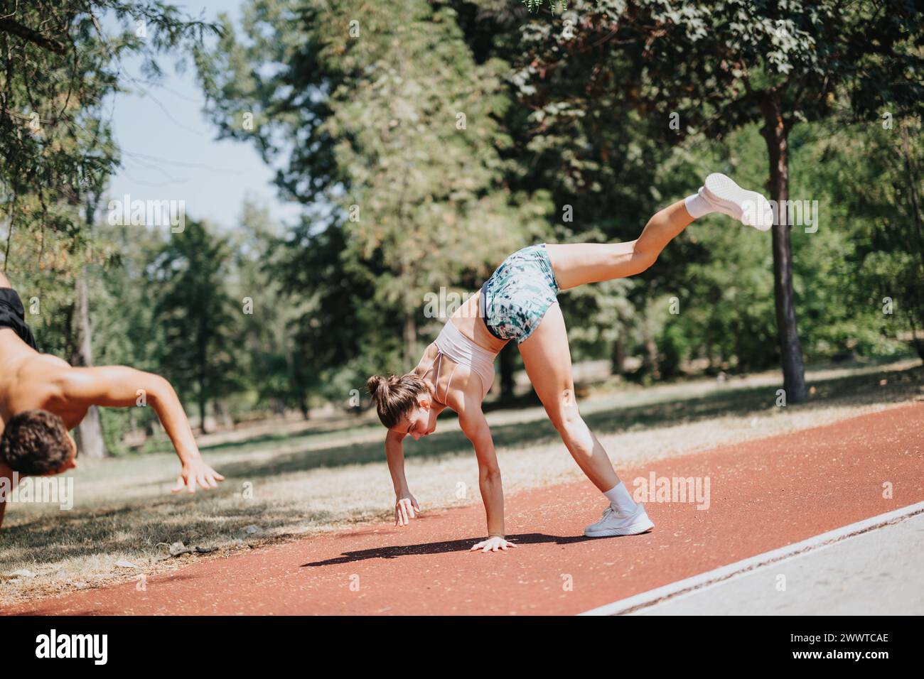 Sportspeople doing cartwheel hi-res stock photography and images - Alamy