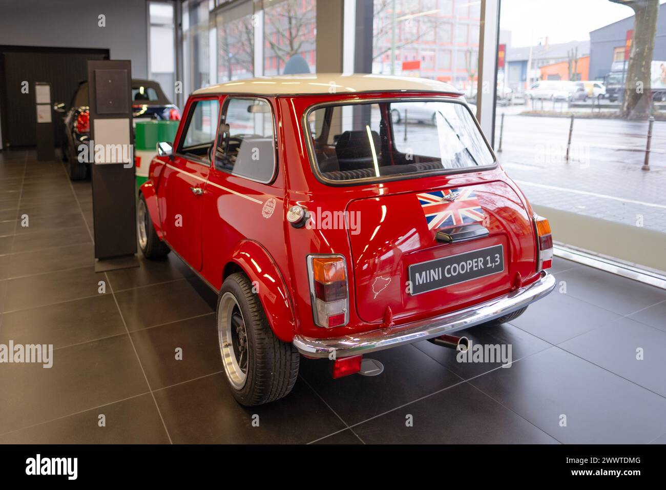 vintage Red Classic Rover MINI Cooper 1,3 Oldtimer in showroom, iconic ...