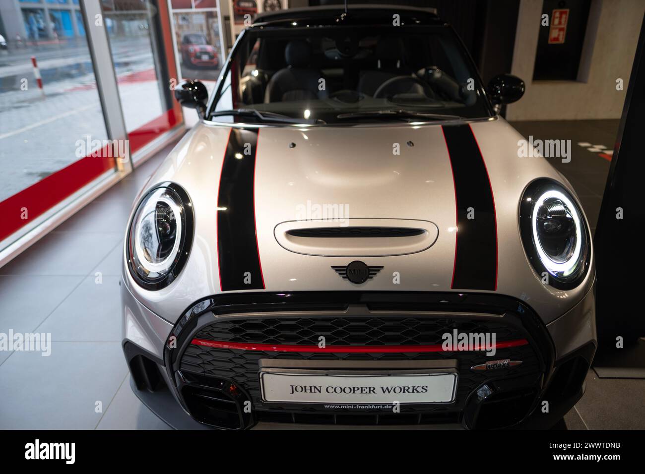 silver MINI John Cooper Works in showroom, automotive concern BMW Group ...