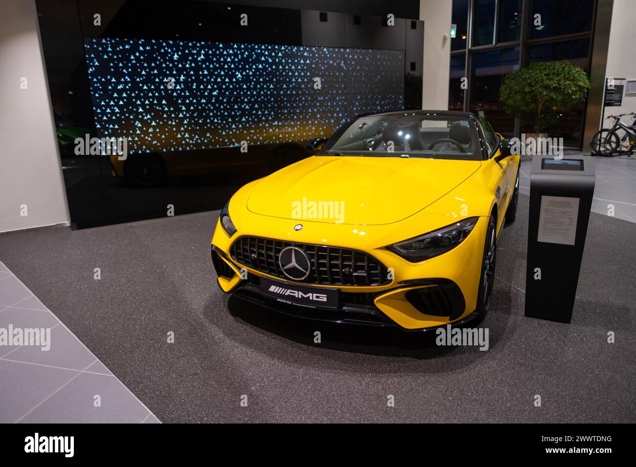 powerful yellow Mercedes-AMG SL 63 Roadster racing car parked in ...