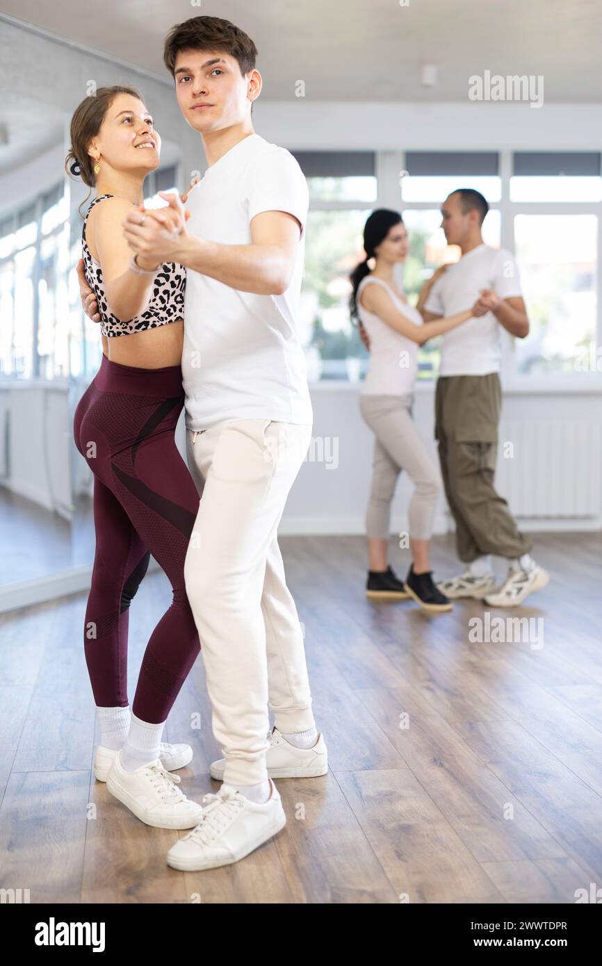 People learning tango dance at lessons in dance studio Stock Photo - Alamy