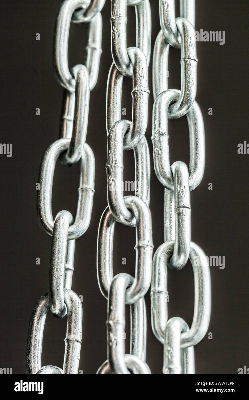 Strong chain black background Stock Photo - Alamy
