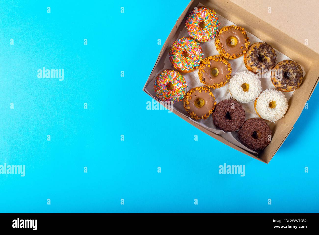 Colorful donuts in box Stock Photo - Alamy