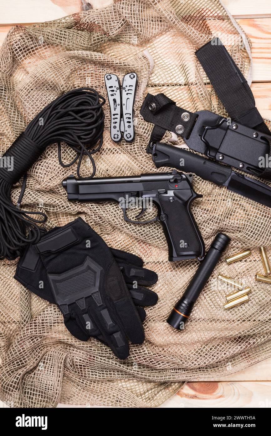 gun, knife with sheath, compass Stock Photo - Alamy