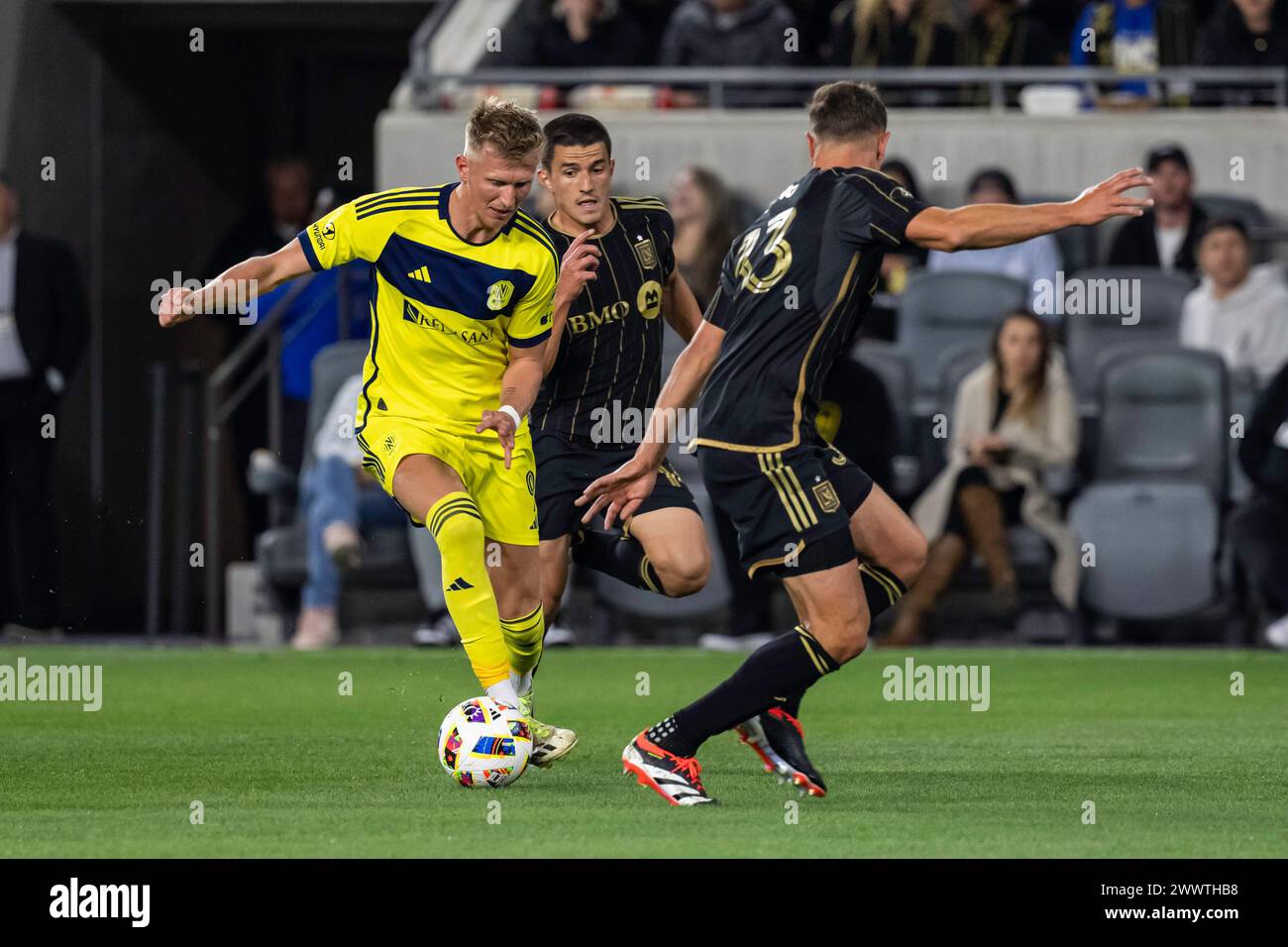 Nashville SC forward Sam Surridge (9) is defended by LAFC defender ...