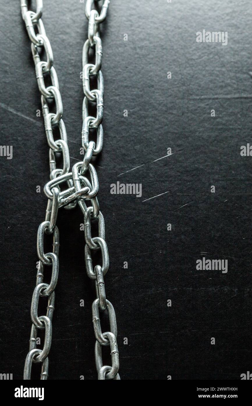 Strong chain black background Stock Photo - Alamy