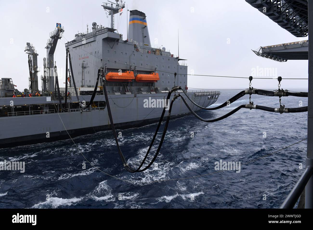 The Wasp-class amphibious assault ship USS Boxer (LHD 4) conducts a ...